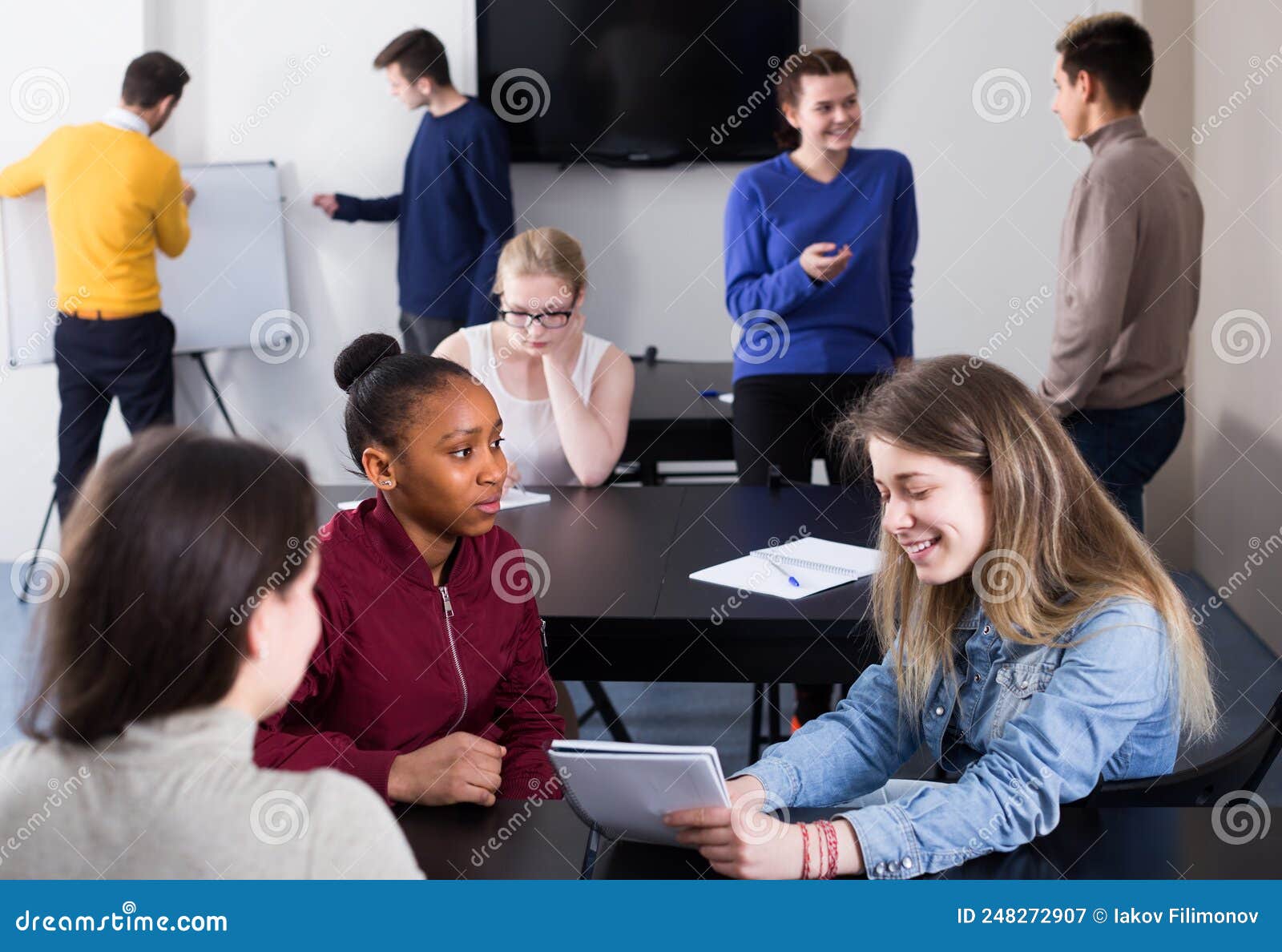 Energetic and Female Students Having Conversation at Recess Stock Image ... Energetic and Female Students Having Conversation at Recess Stock Image ...