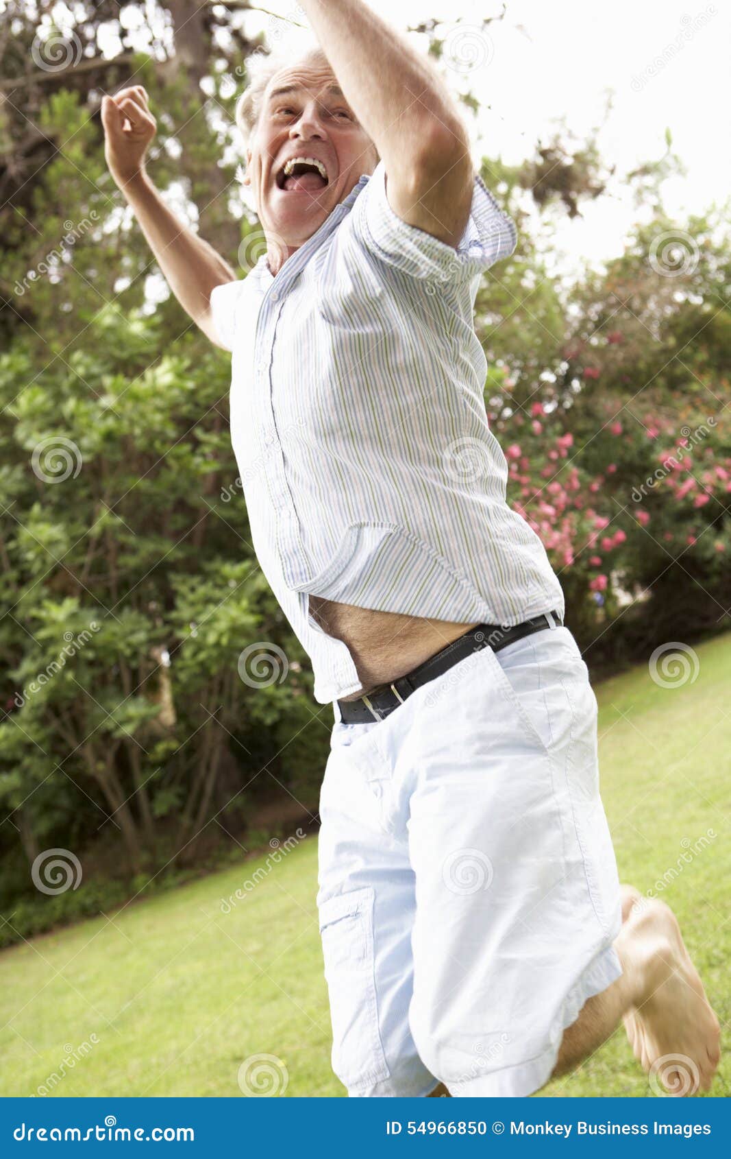Energetic Senior Man in Countryside Stock Photo - Image of jumping ...