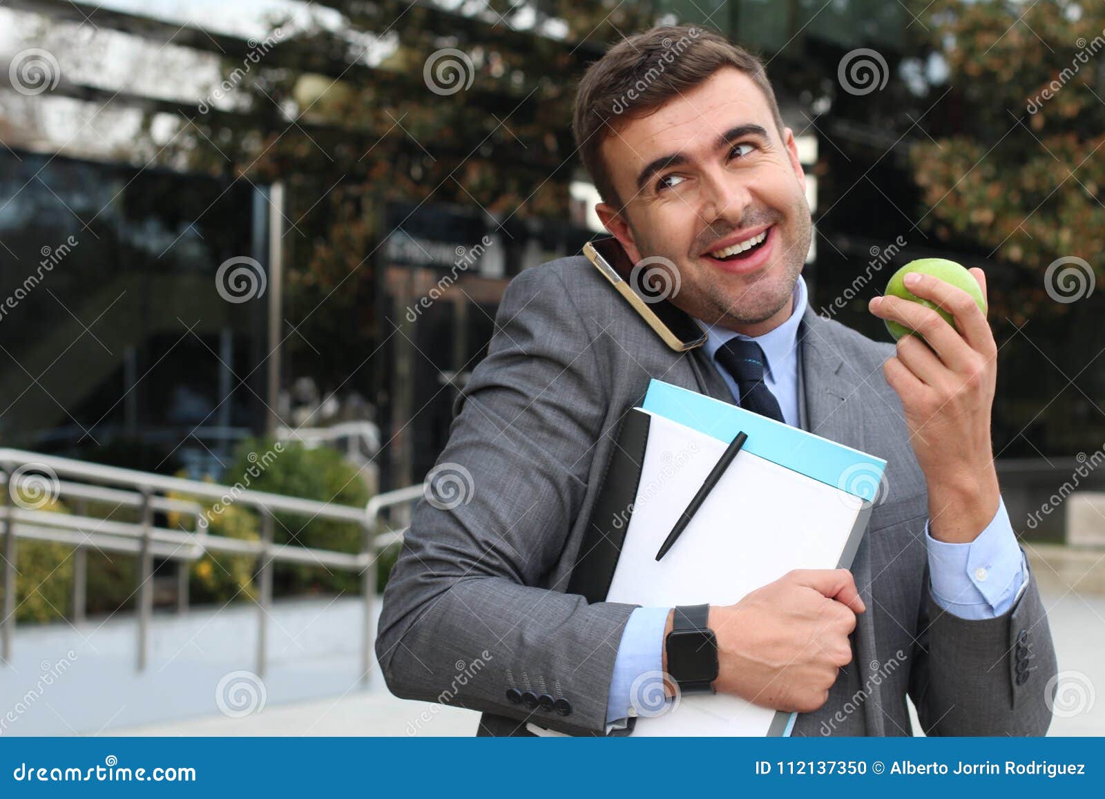 Energetic Worker Multitasking with Copy Space Stock Photo - Image of ...