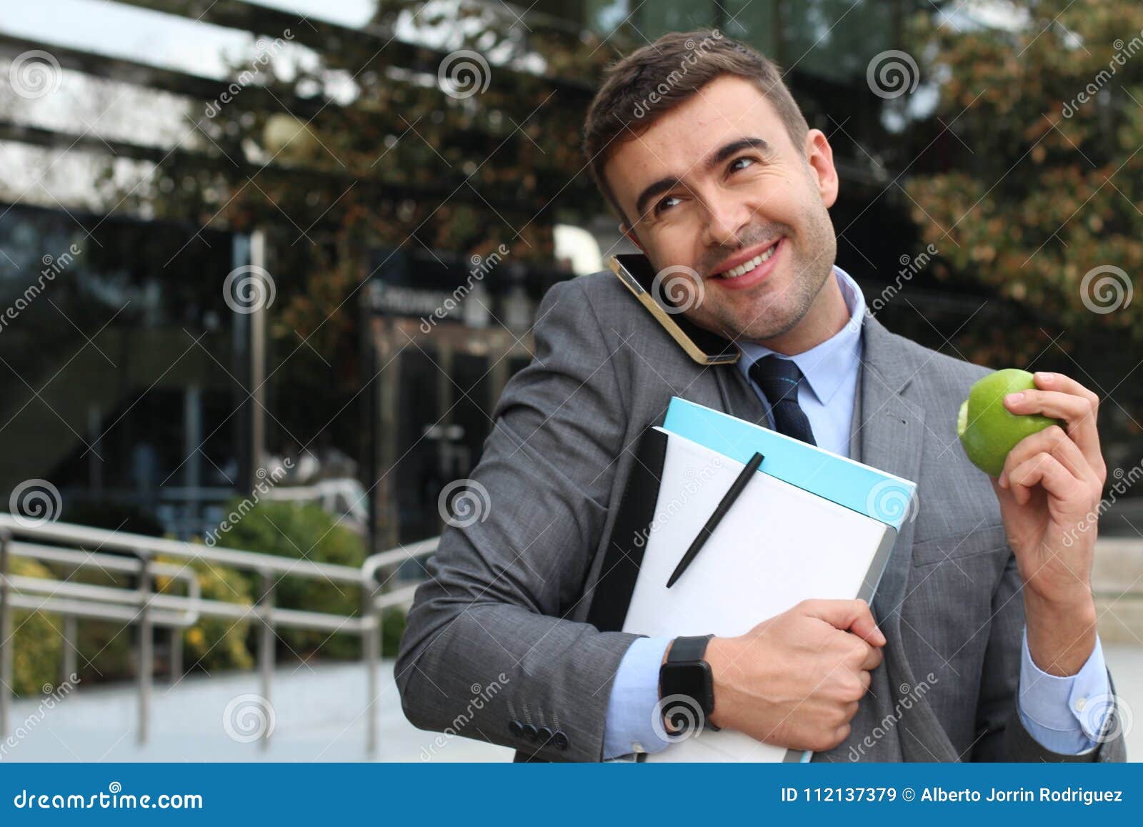 Energetic Worker Multitasking with Copy Space Stock Image - Image of ...