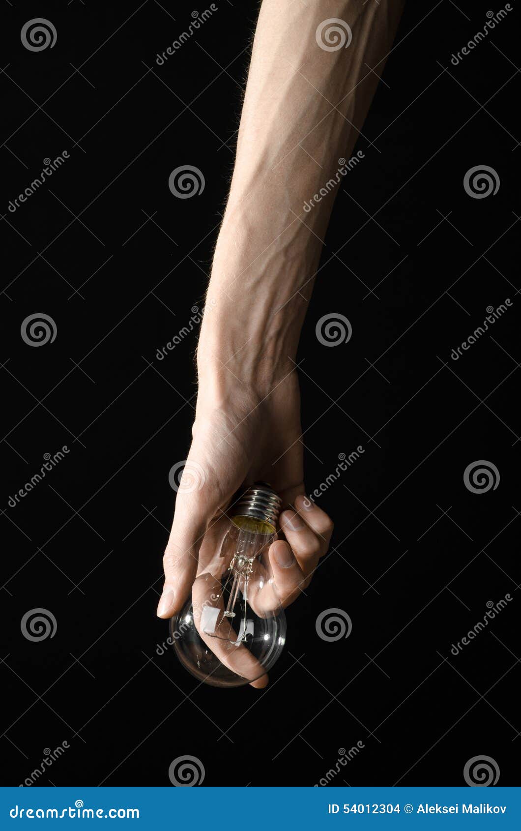 Energy Consumption and Energy Saving Topic: Human Hand Holding a Light ...