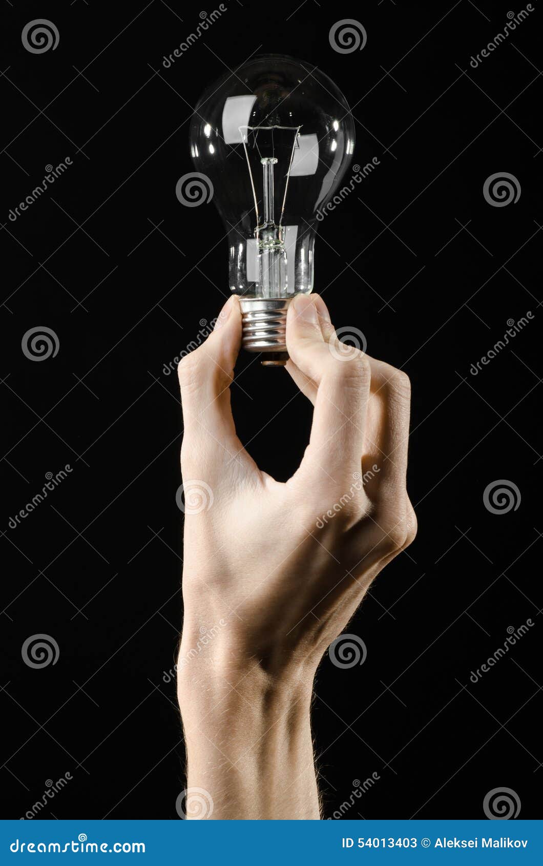 Energy Consumption and Energy Saving Topic: Human Hand Holding a Light ...