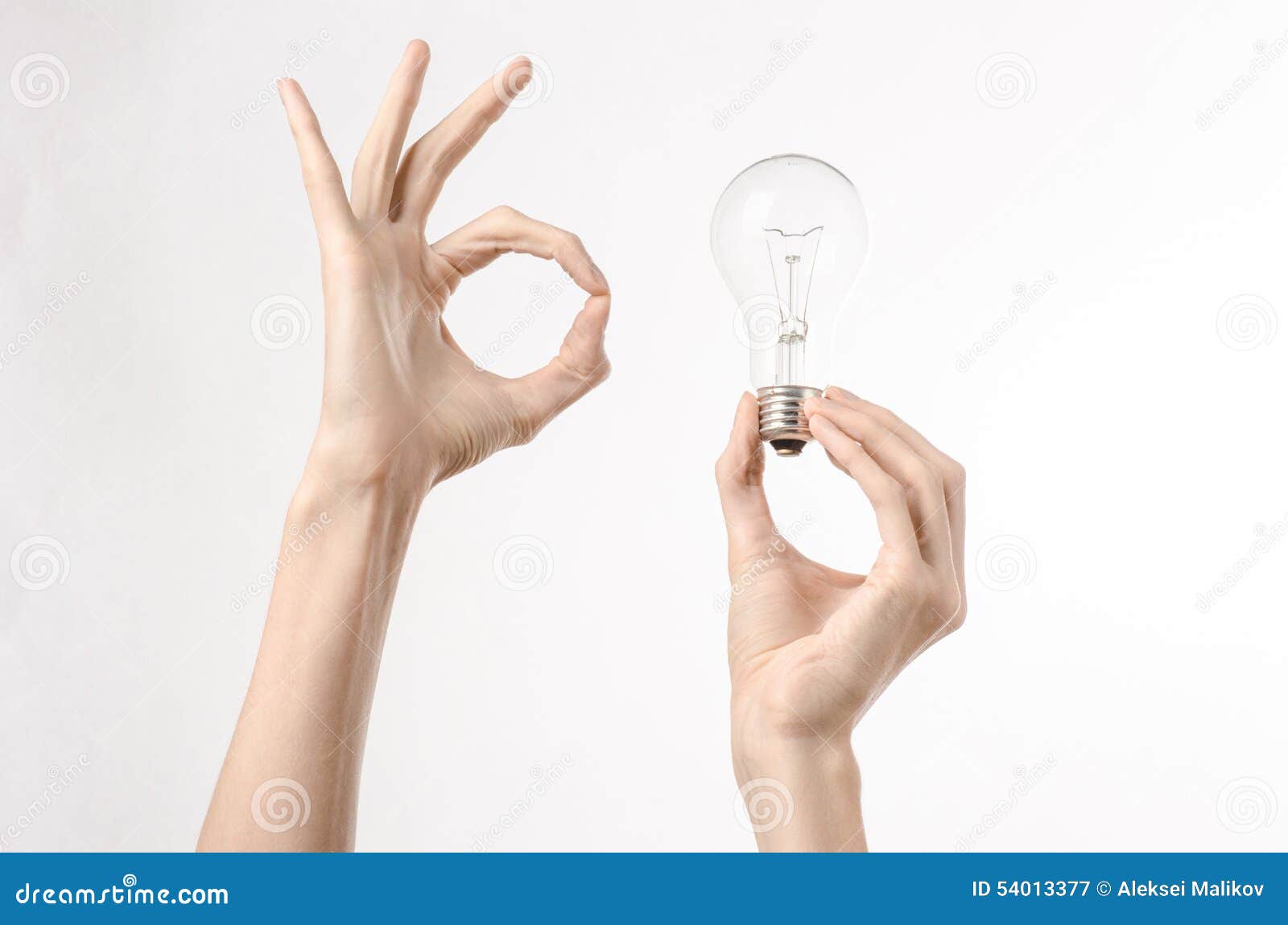 Energy Consumption and Energy Saving Topic: Human Hand Holding a Light ...