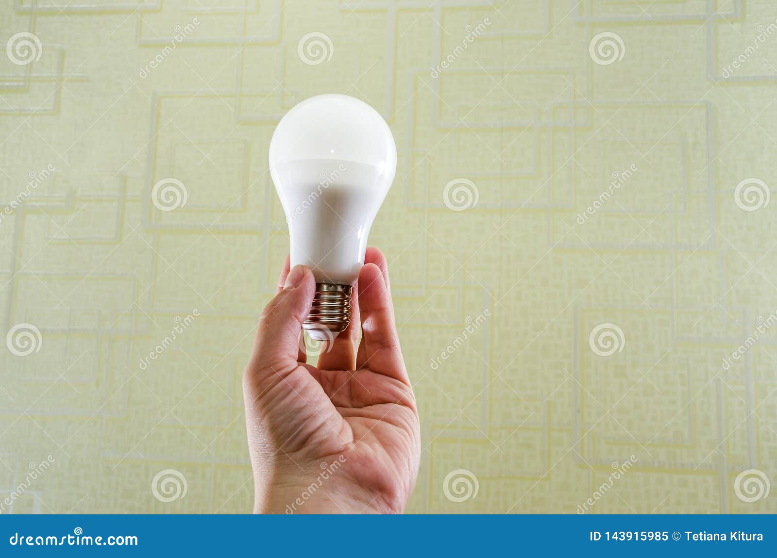 Energy Saving Light Bulb in Hand Stock Image - Image of light, bulb ...