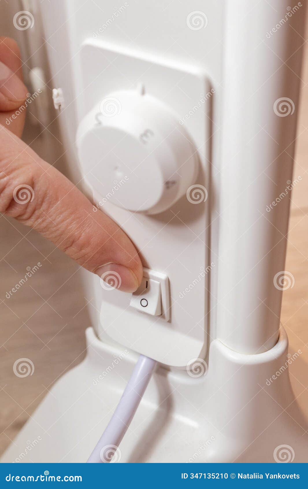 Energy Saving. Switch Off Button of the Electrical Appliance. Finger on ...