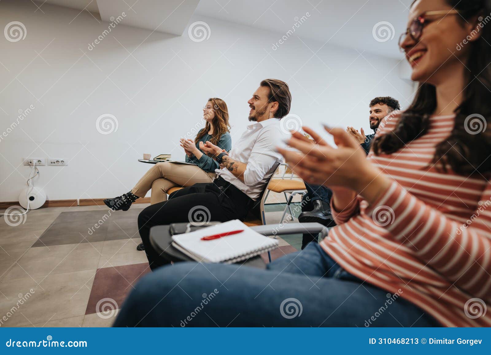 Engaged Audience in a Casual Seminar Environment, Clapping Hands ...