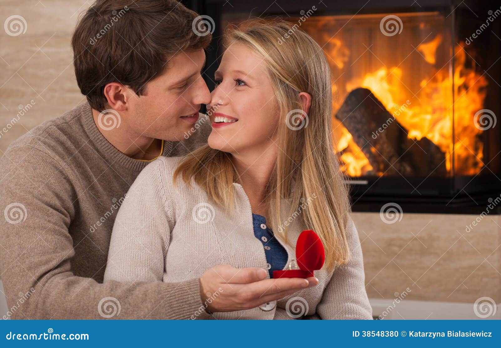Engaged couple at home stock photo. Image of proposing - 38548380