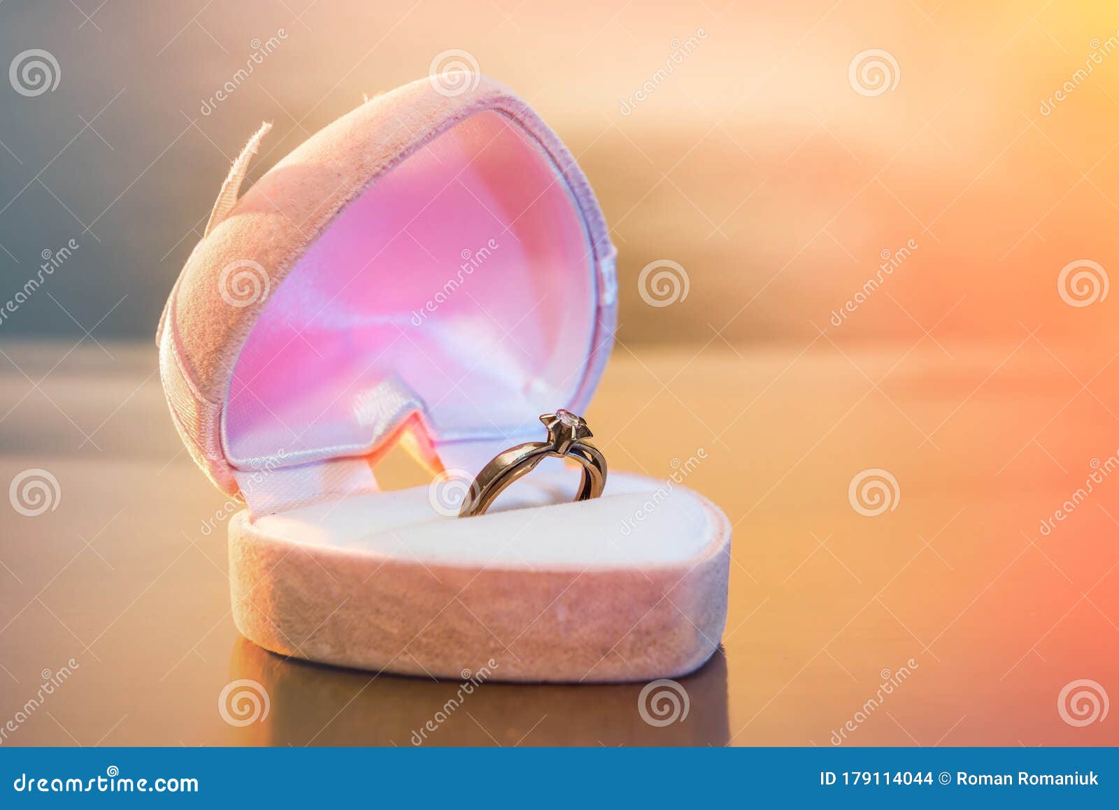 Engagement Proposal Ring In Box On The Gold Glitter Sparkle Background ...