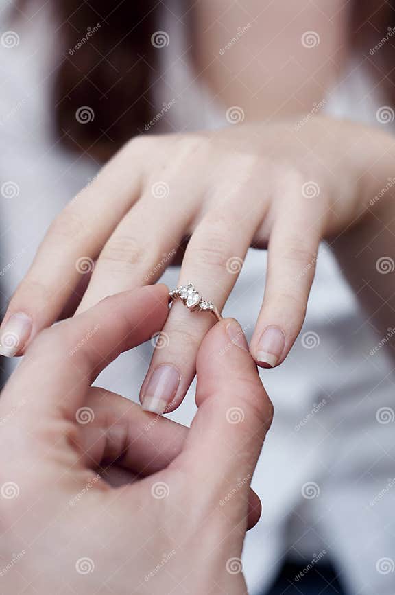 Engagement Ring into a Finger Stock Photo - Image of natural, people ...