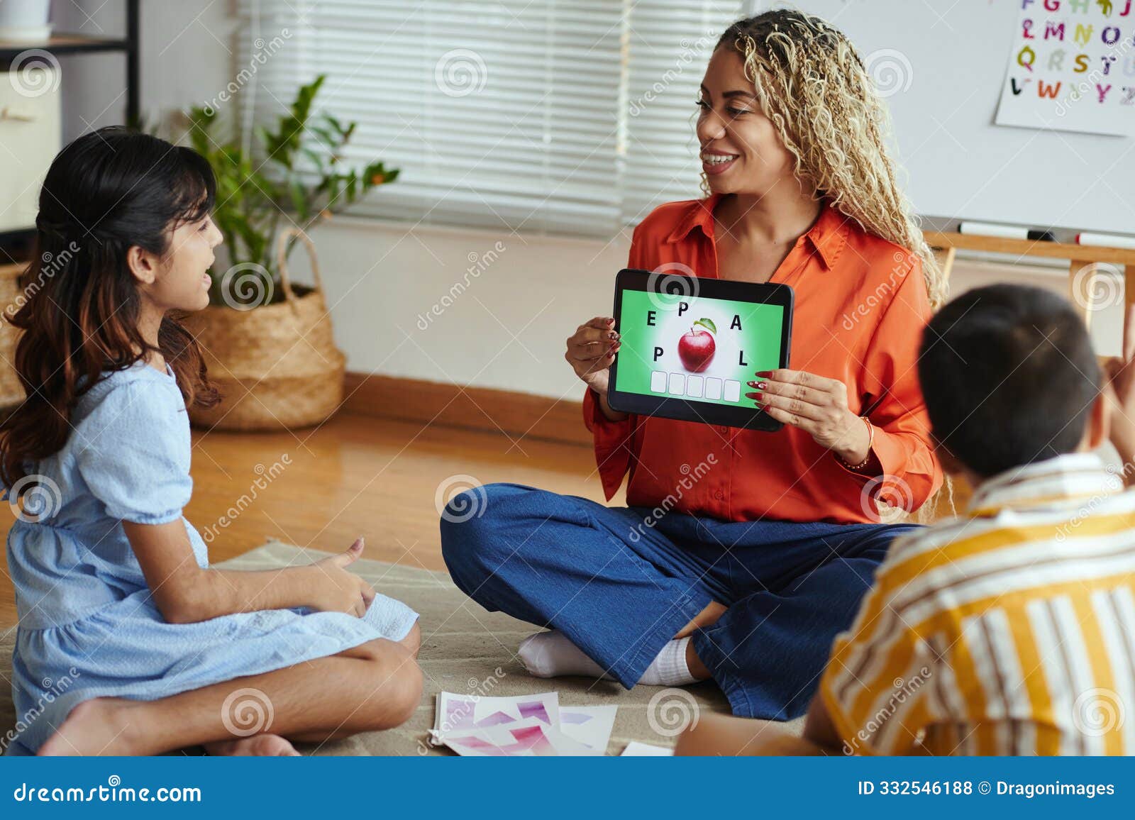 Engaging Children in Educational Activity during Lesson Stock Photo ...