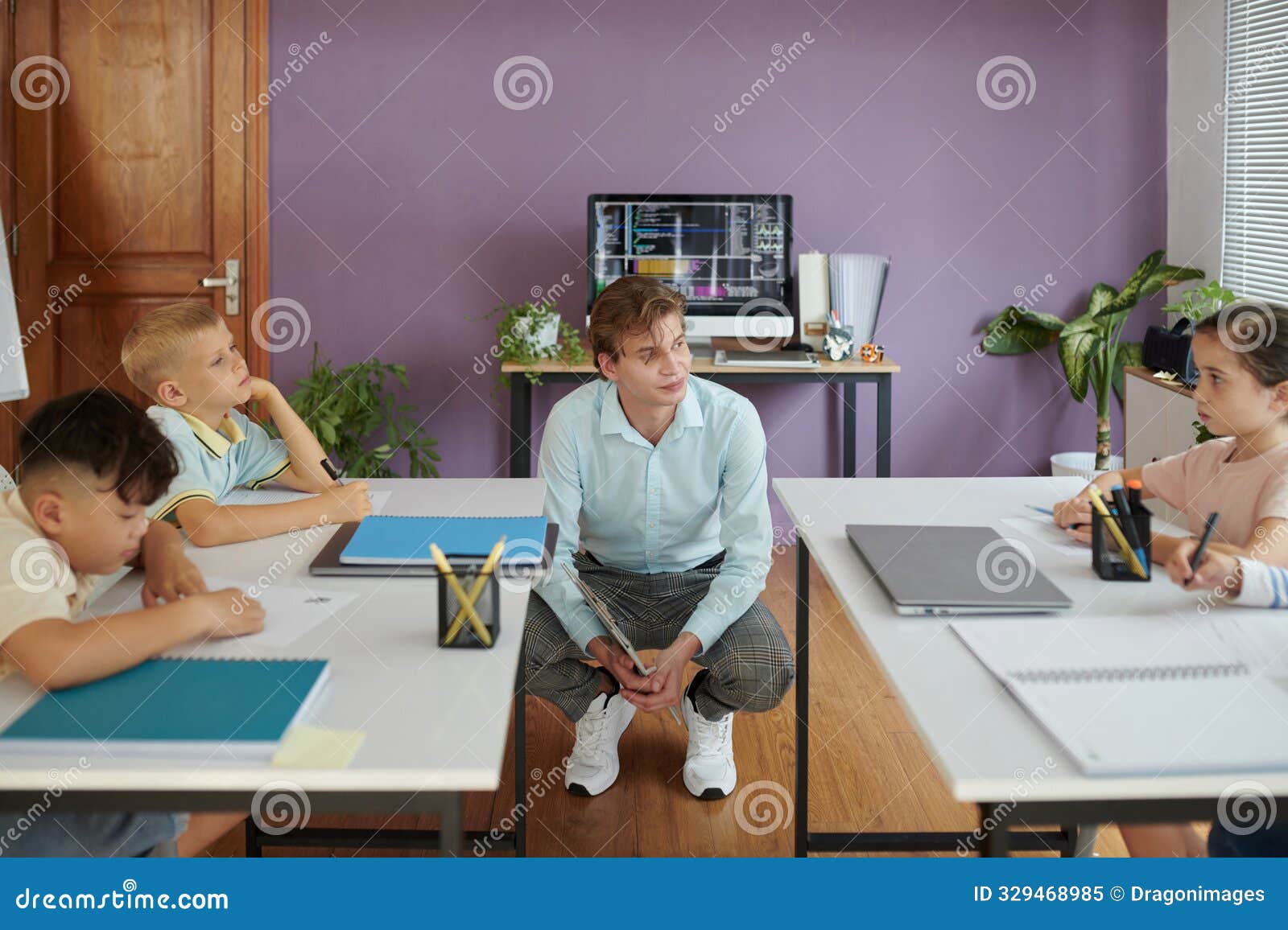 Engaging in Group Discussion with School Children Stock Image - Image ...