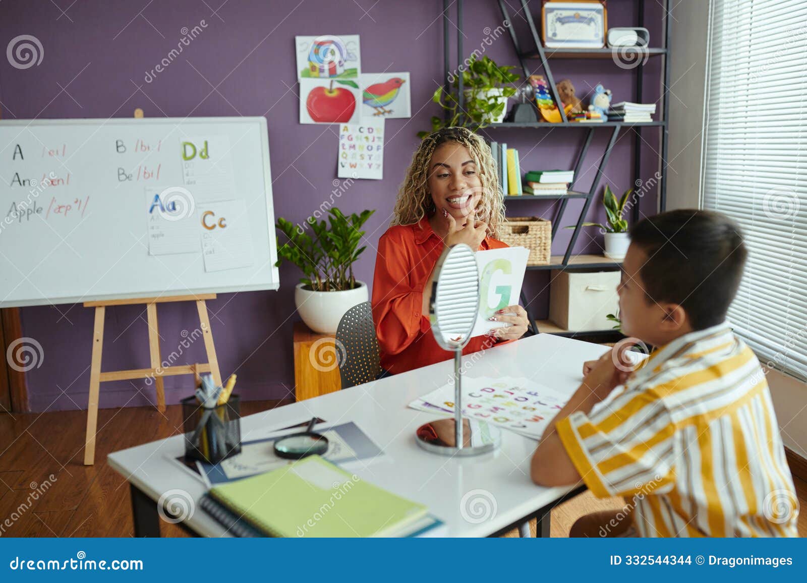 Engaging in Language Learning Session with Young Student Stock Photo ...