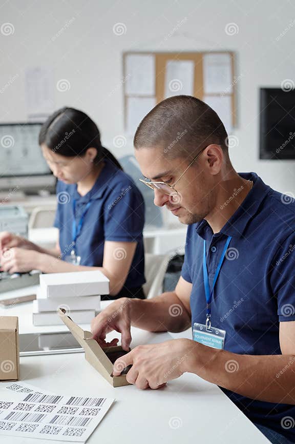 Engaging in Office Tasks with Technology and Devices Stock Image ...