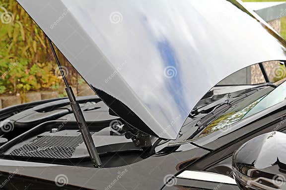 The Engine of a Black Car with Open Bonnet Stock Image - Image of ...