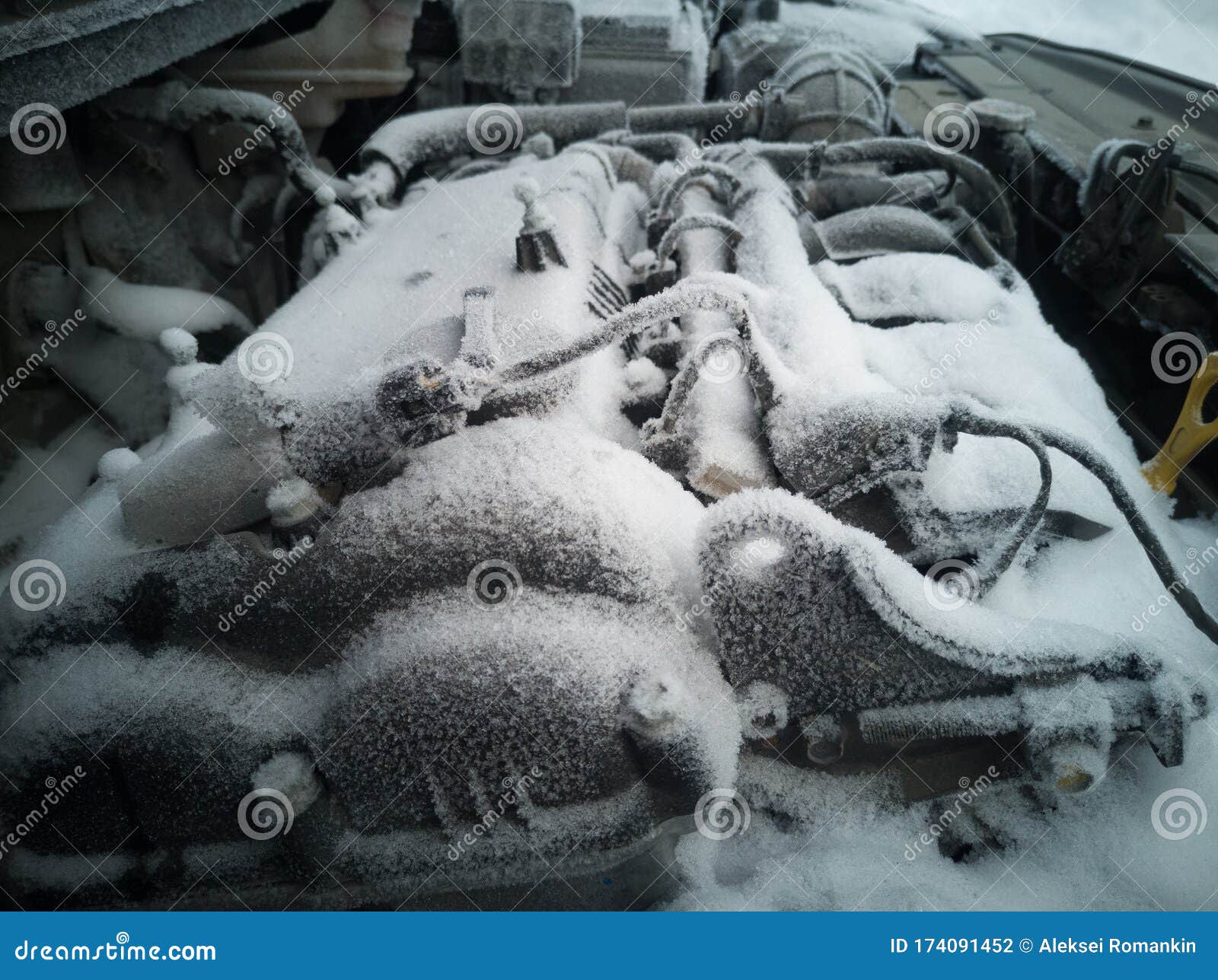 Engine Close-up. the Engine Compartment is Covered with Snow and Ice ...