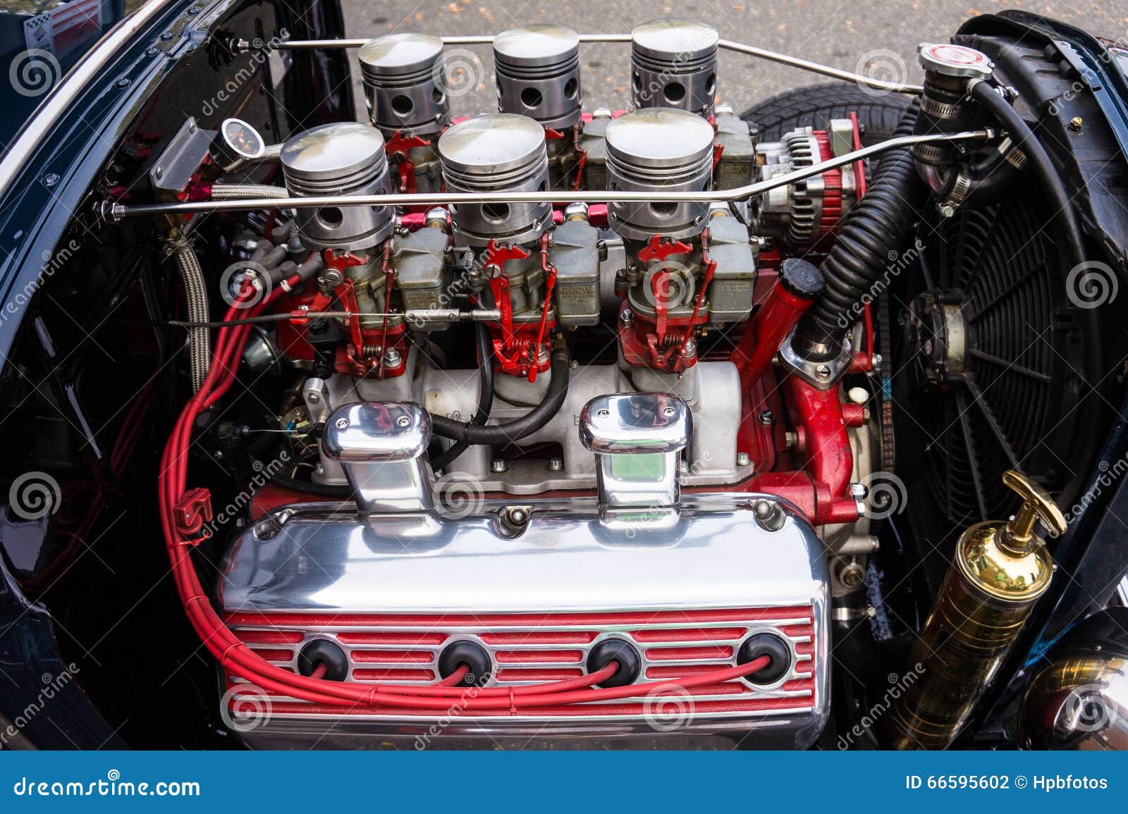 Engine in a Collectors Car stock photo. Image of hose - 66595602