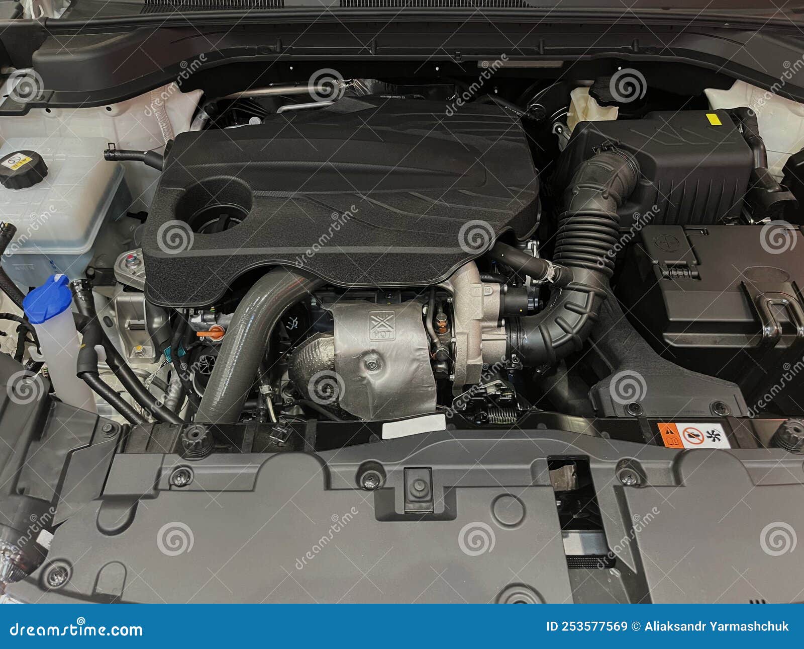 The Engine Compartment of the Car, a View of the Engine. Four-cylinder ...