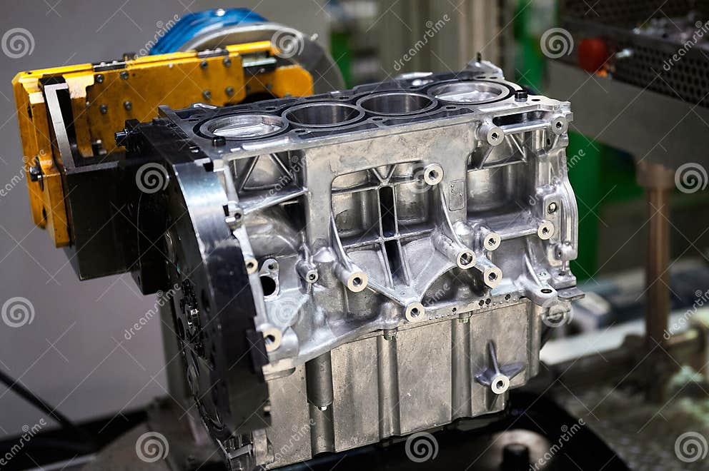 Engine Cylinder Block with Installed Pistons in Workshop Stock Photo ...