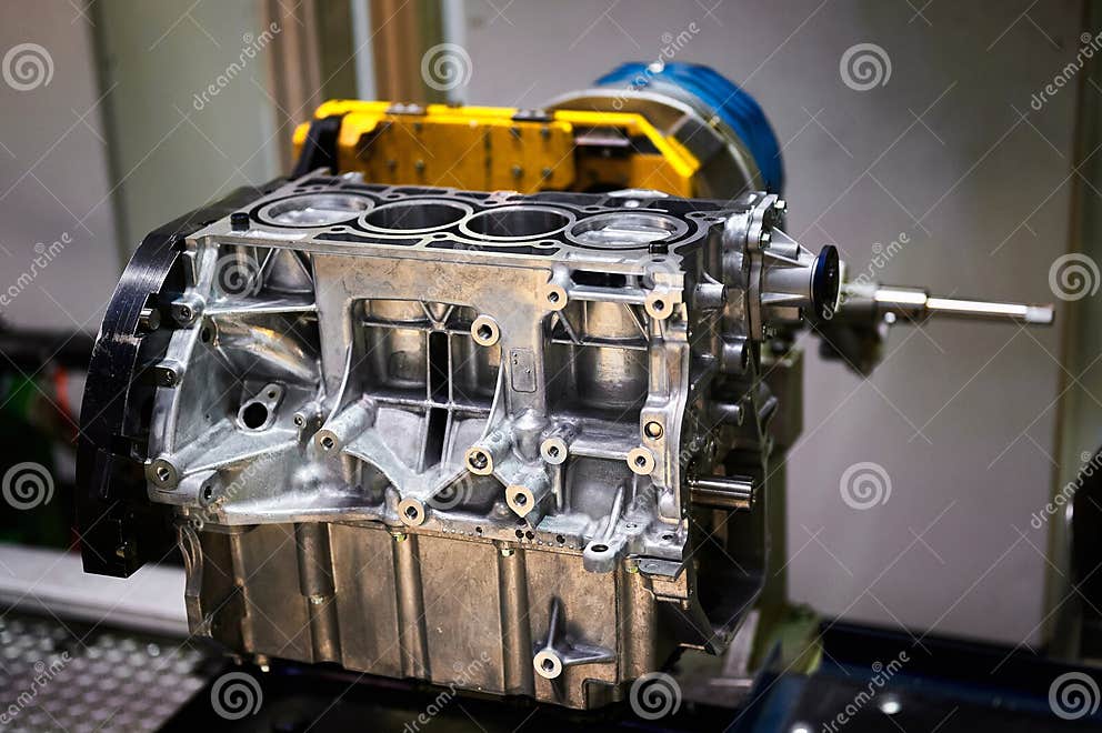 Engine Cylinder Block with Installed Pistons in Workshop Stock Image ...