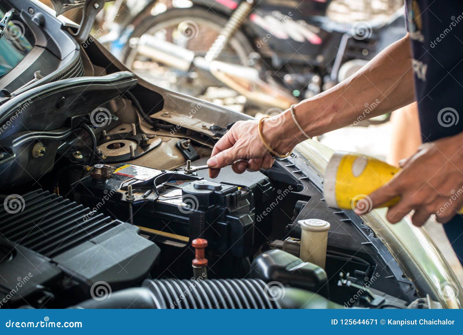 Engine Engineer Is Replacing Car Battery Because Car Battery Is ...