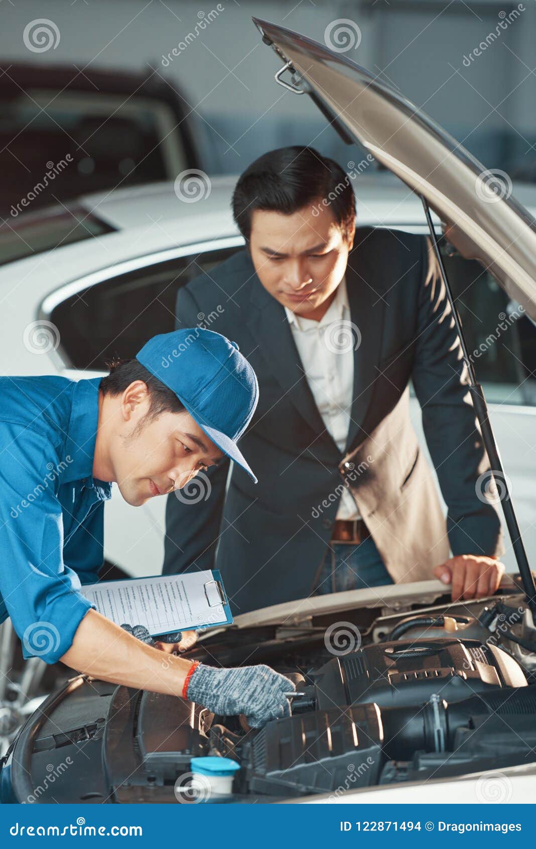 Engine examination stock photo. Image of repairing, male - 122871494