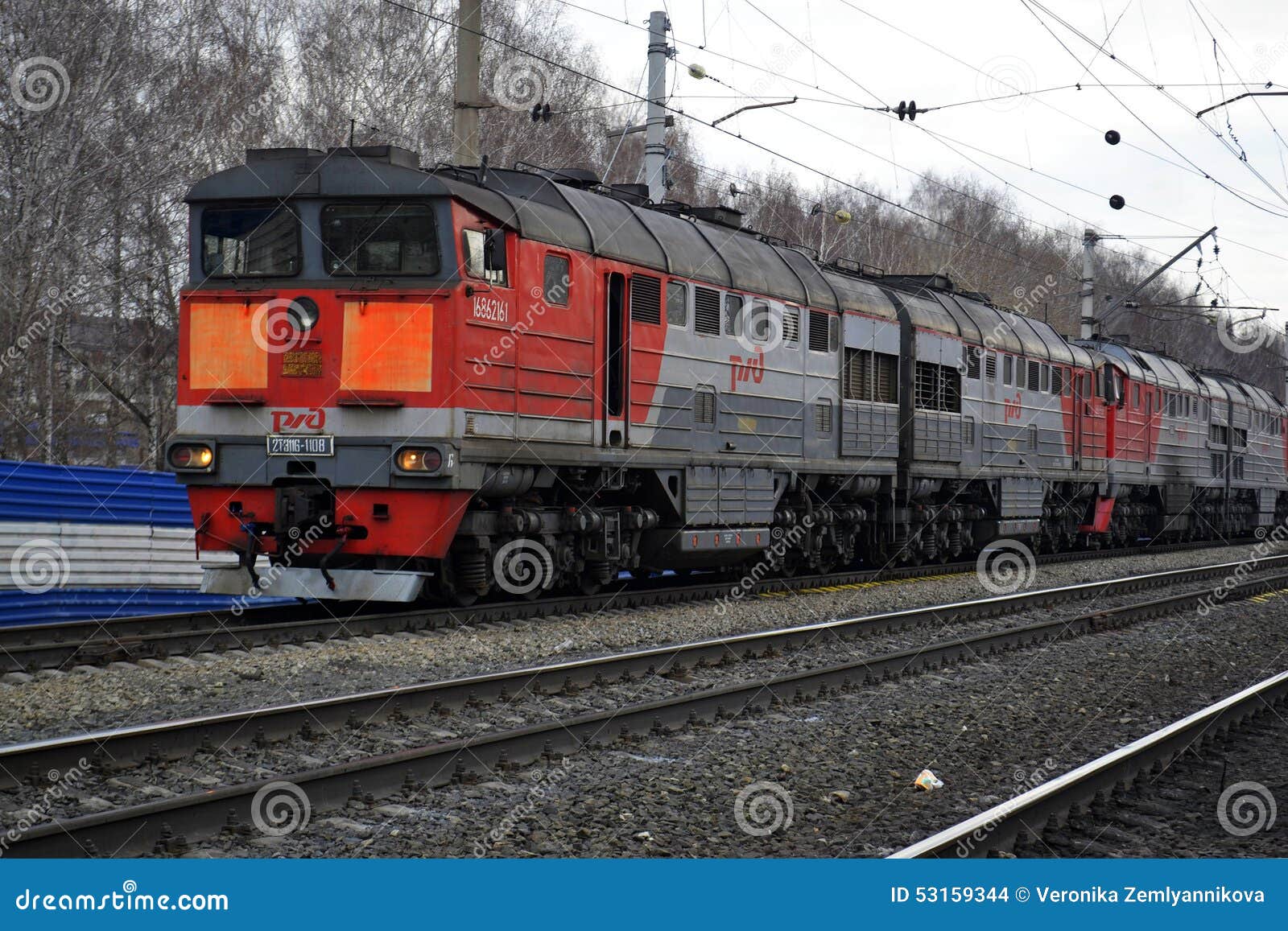 The Engine of Gray Color Moves on Railway Tracks. Editorial Stock Image ...