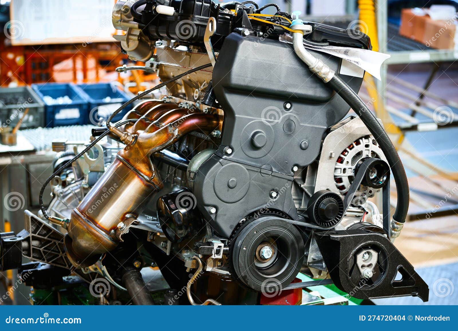 Engine Installing in Car Compartment in Assembling Workshop Stock Photo ...