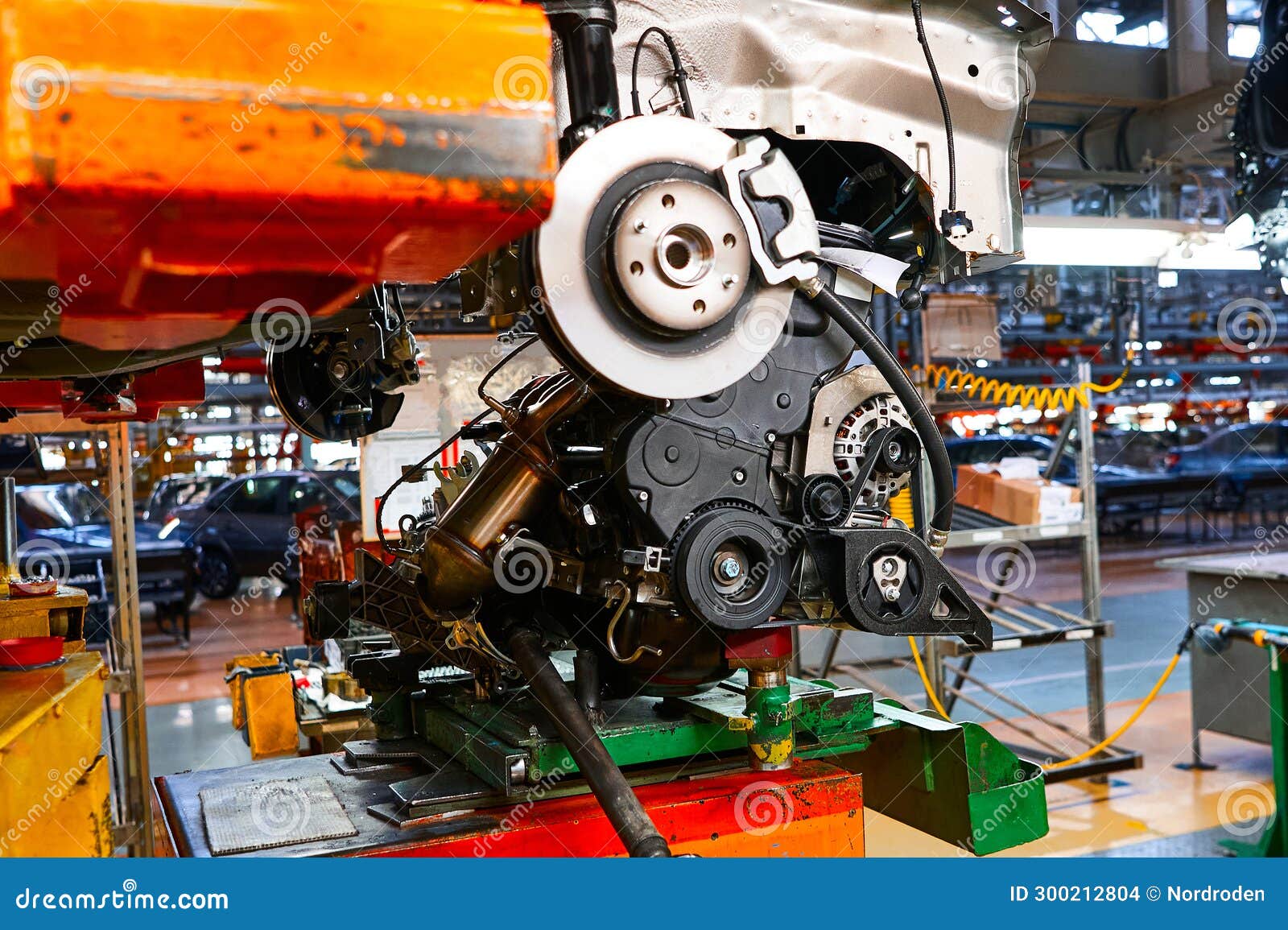 Engine Installing in Car Compartment in Assembling Workshop Stock Photo ...