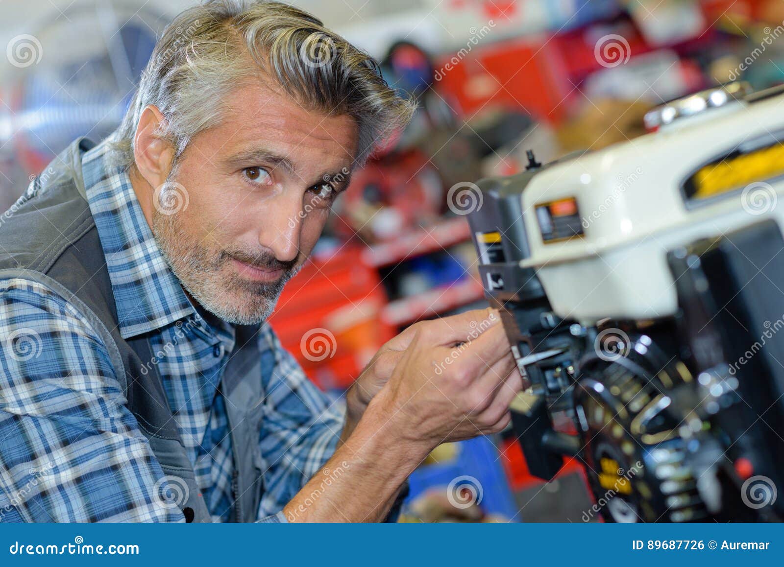 Engine mechanic at work stock photo. Image of working - 89687726
