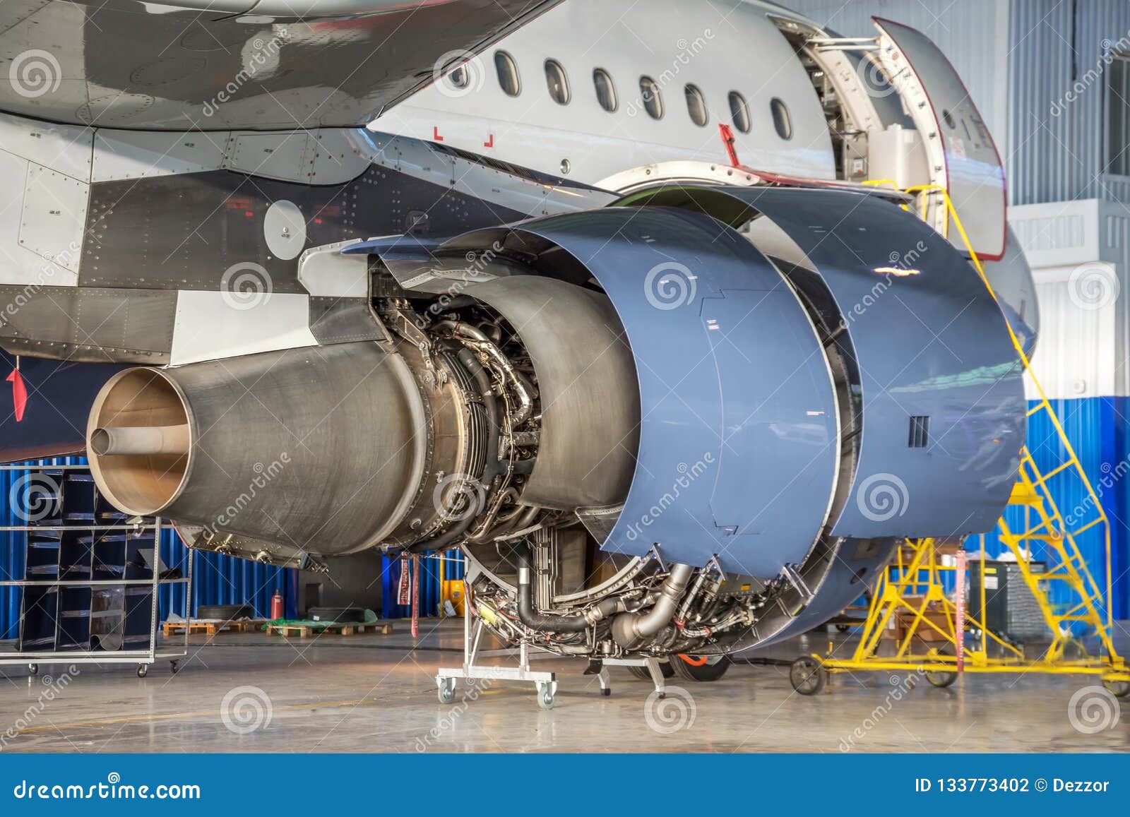 Engine with an Open Hood of the Aircraft, the Rear View of the Nozzle ...