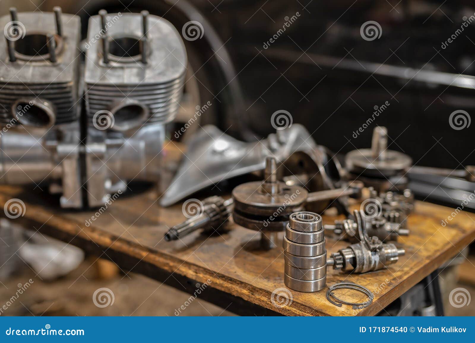 Engine Parts of an Old Motorcycle are Spread Out on the Table Stock ...