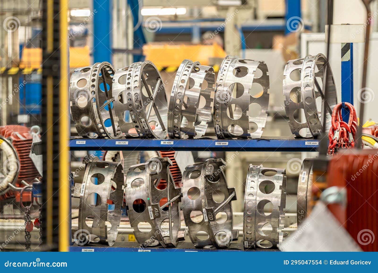 Engine Parts of Various Diameters in the Rack at the Factory Stock ...