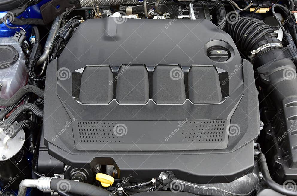 Engine in a passenger car stock photo. Image of metal - 215422560