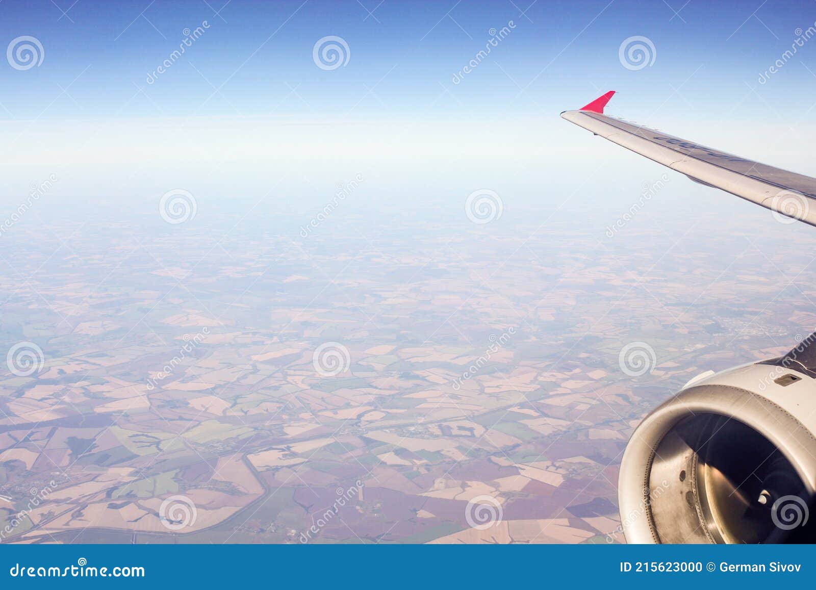 Engine under the wing stock photo. Image of earth, airplane - 215623000