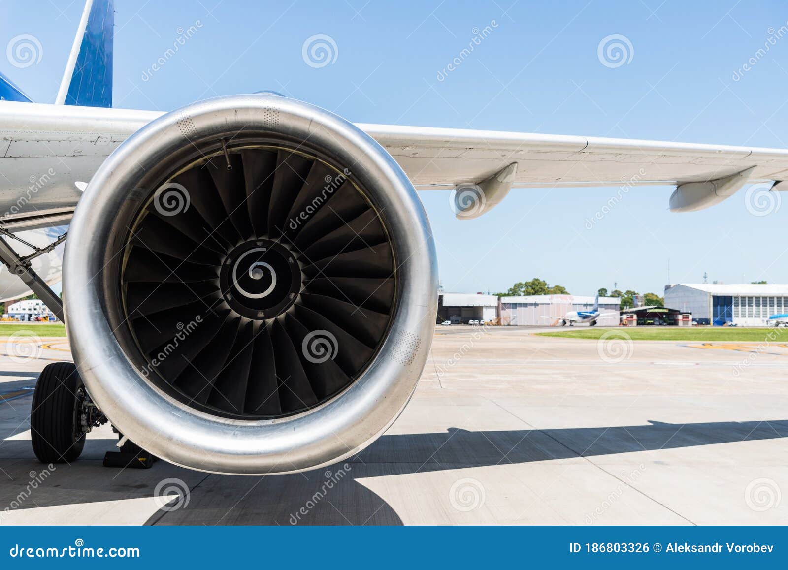 Engine and a Wing of an Aircraft Plane at the Airport. Stock Photo ...