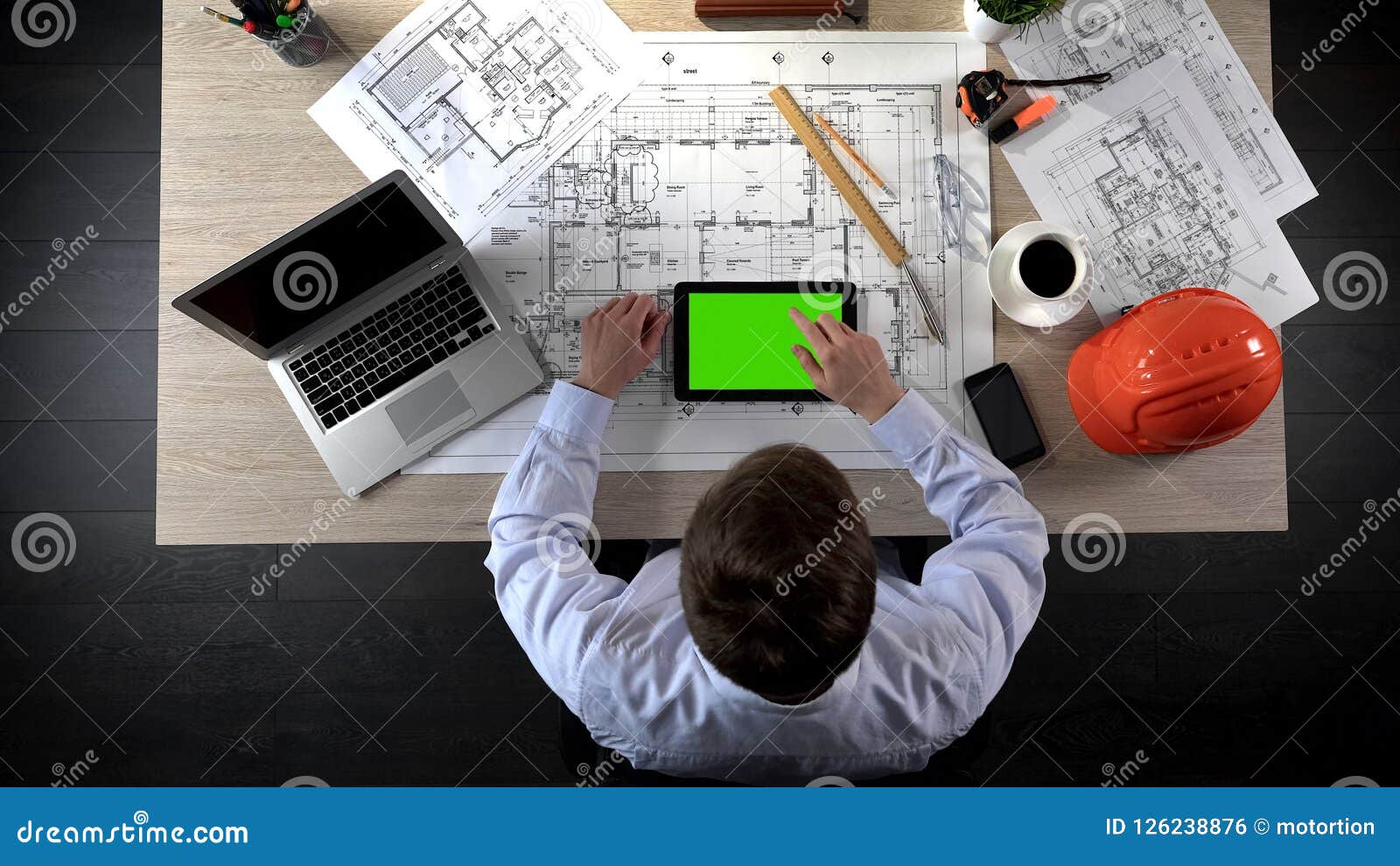 Engineer Adding Marks To Online Layout of Building Project, Green ...