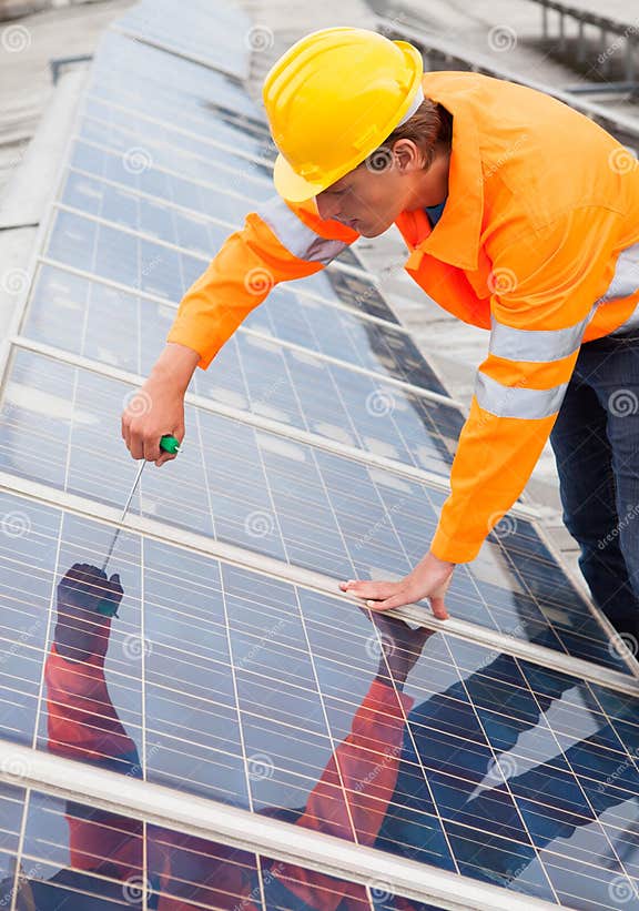 Engineer Adjusting Solar Panels Stock Photo - Image of high ...