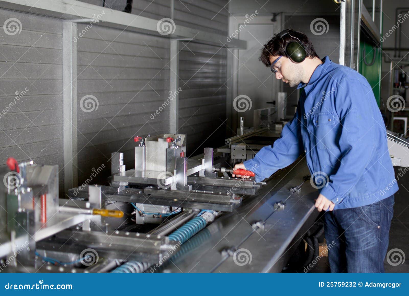 Engineer Adjusts a Machine in Factory Stock Photo - Image of work ...