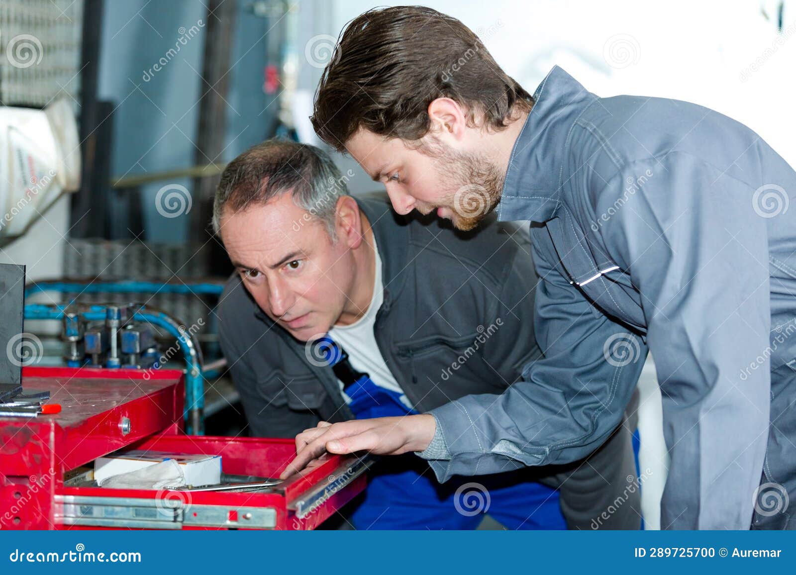 Engineer and Apprentice Planning Cnc Machinery Project Stock Photo ...