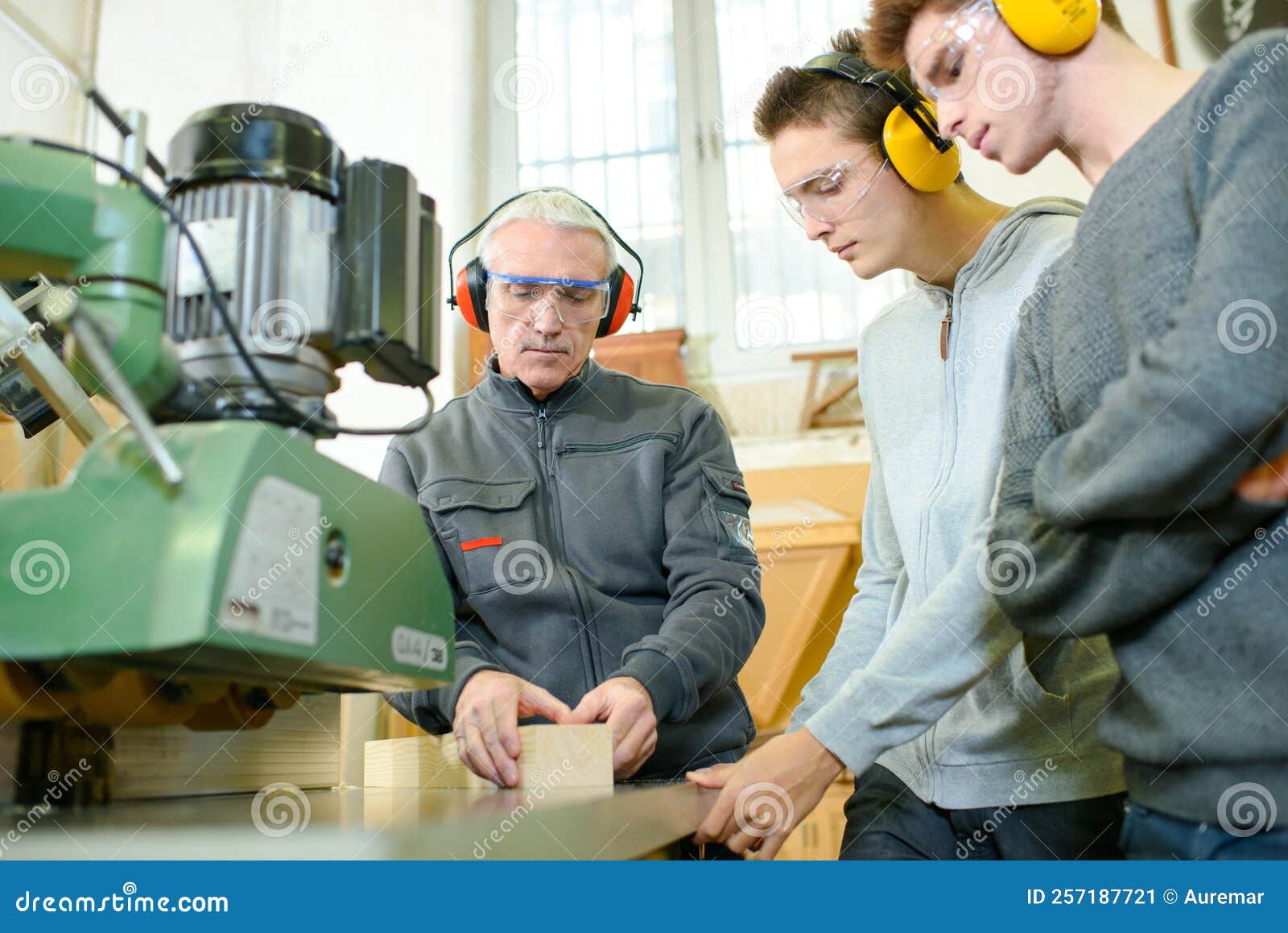 Engineer and Apprentices Using Automated Milling Machine Stock Image ...