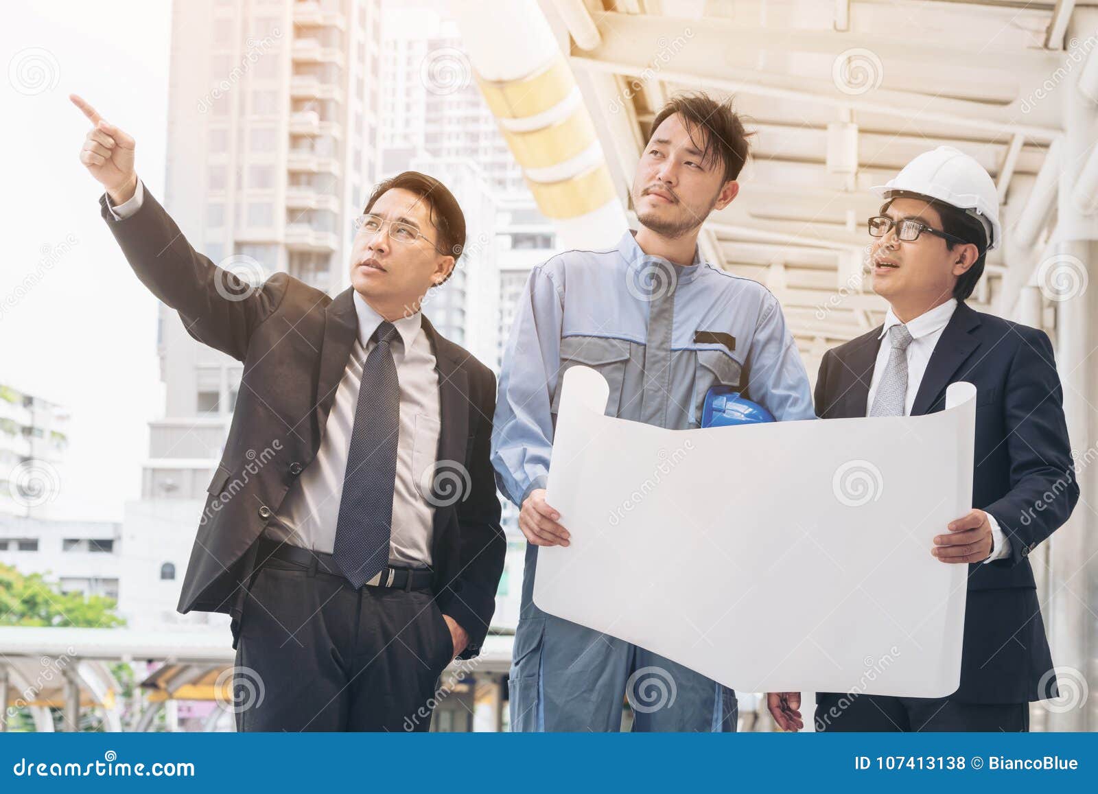 Engineer and Business Man Discuss about Blueprint Stock Photo - Image ...