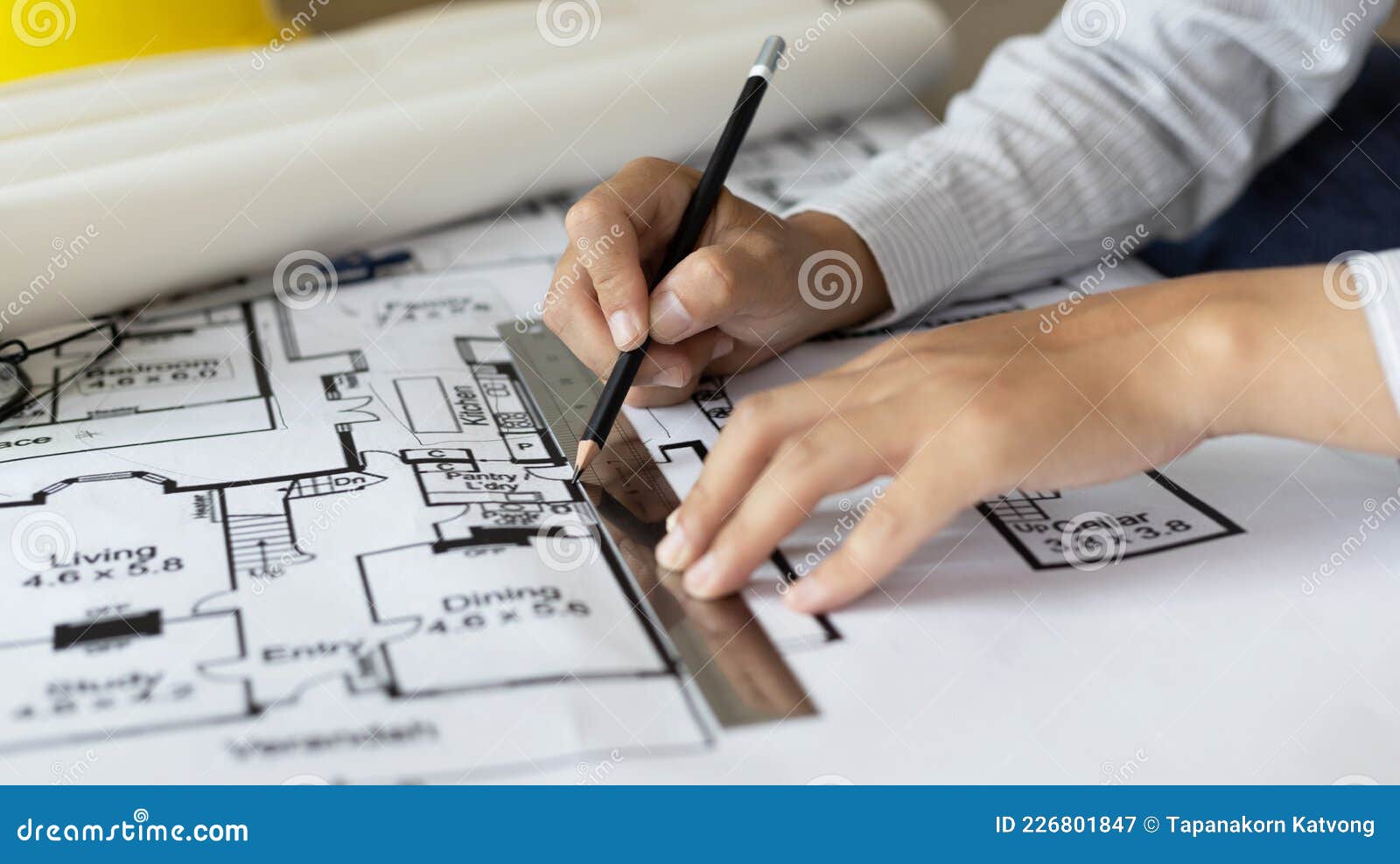 Engineer and Architect Concept, Man Uses a Ruler To Measure the Floor ...