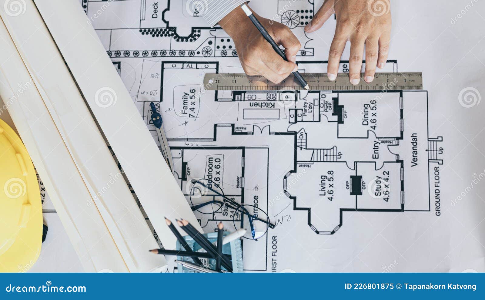 Engineer and Architect Concept, Man Uses a Ruler To Measure the Floor ...