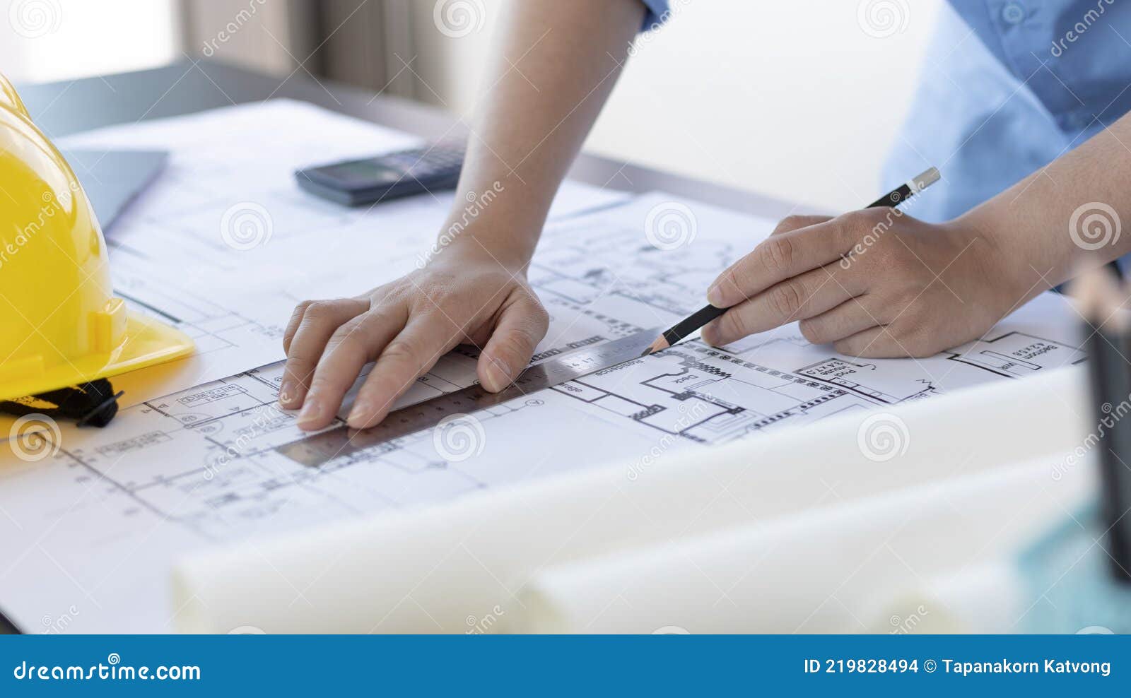 Engineer and Architect Concept, Man Uses a Ruler To Measure the Floor ...