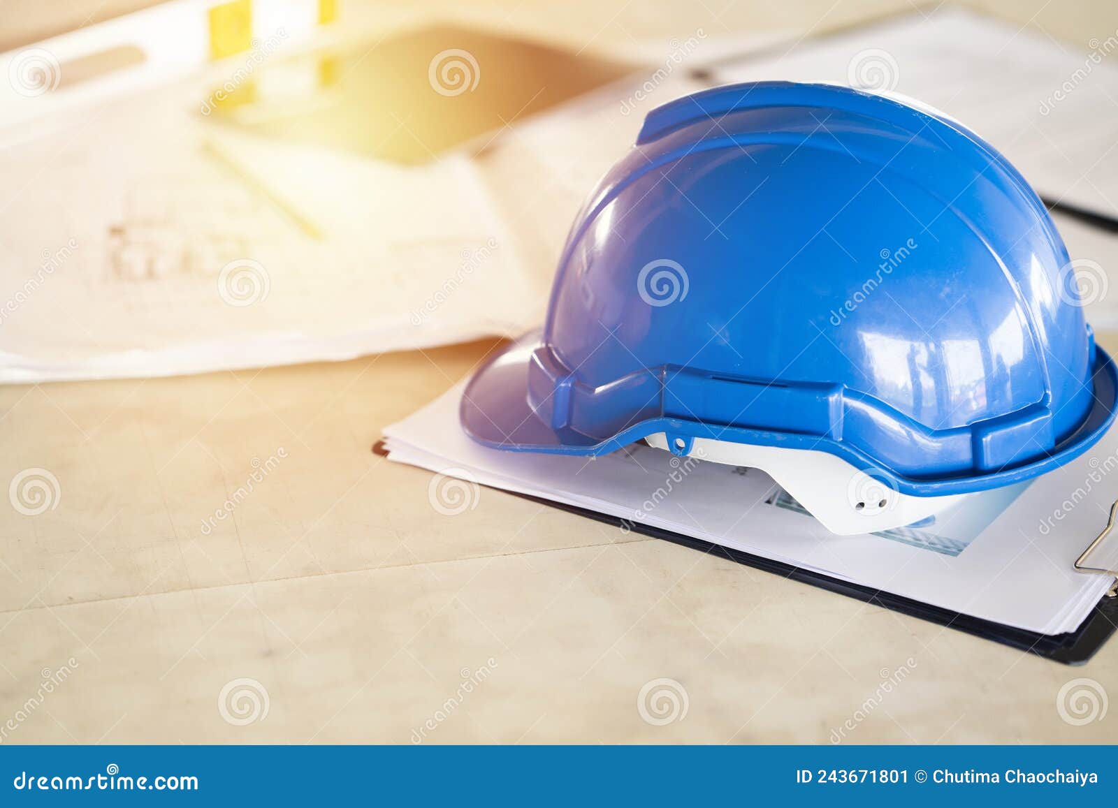 Engineer or Architect Desk with Blue Helmet on the Table in the Office ...