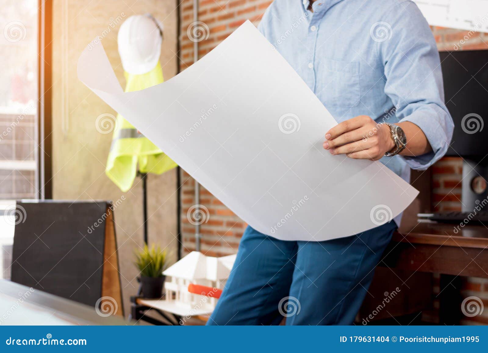 Engineer or Architect is Reading Paper Blueprint Project Plan. Civil ...
