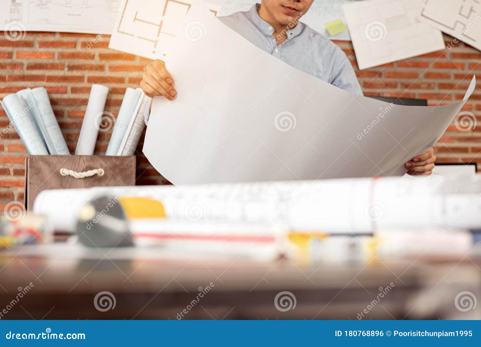 Engineer or Architect is Reading Paper Blueprint Project Plan. Civil ...