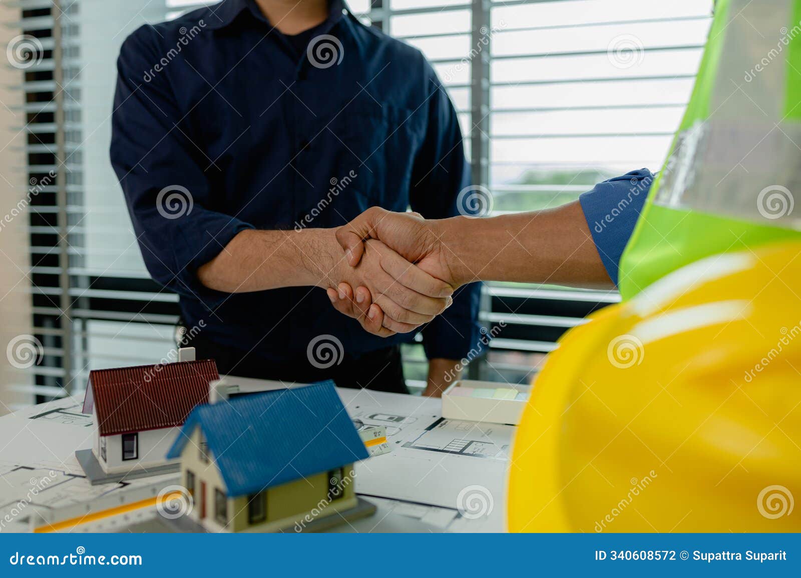 Engineer and Architect are Shaking Hands To Celebrate because they Just ...