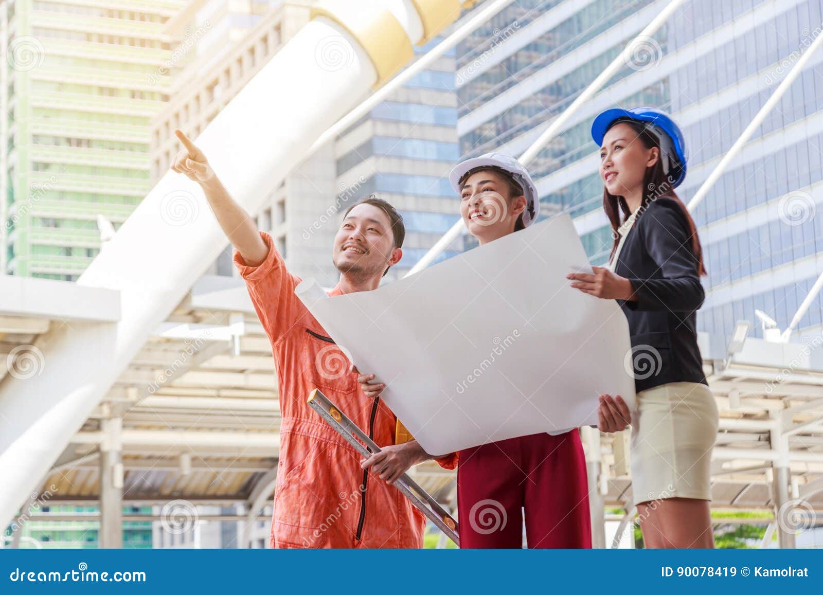 Engineer or Architect Team and Worker Looking Paper Plans Stock Image ...