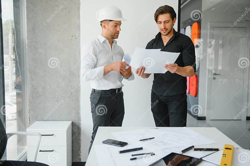 Engineer or Architect Teamwork Working on Construction Project with ...